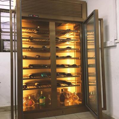 China Custom Rose Gold Stainless Steel Wine Cabinet 220V 50Hz Luxury Villa Display Rack for sale