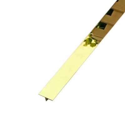 China PVD Colored Stainless Steel Tile Edge Trim 304 8K Mirror Polished T-Shape for Hotel Decoration 10mm for sale