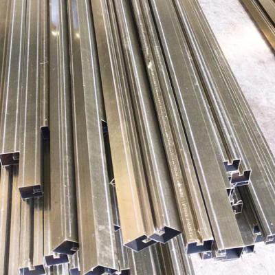 China Brass Color Stainless Steel Trim Strip 10×2438mm Hairline Finish for Glass Dividers for sale