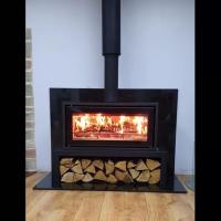 China Modern Freestanding Wood Burning Stove 7kW Output Corten Steel Fireplace 60x50x75cm for sale