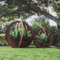 China Decorative Outdoor Large Corten Metal Flower Planters 80cm-140cm Height for Garden Landscape for sale