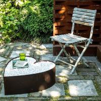 China Large Outdoor Heart Shaped Corten Steel Planter 1100x1070x760mm Garden Ornament for sale