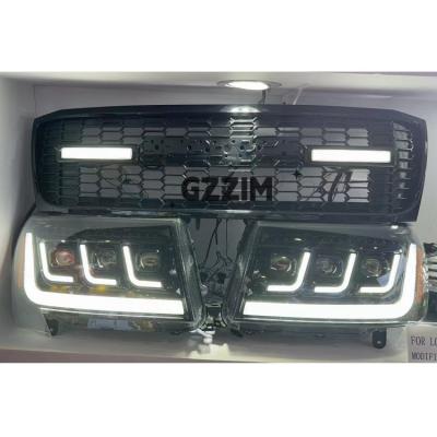 China Toyota Land Cruiser FJ100 Head Light Modified Front Light With Grille for sale