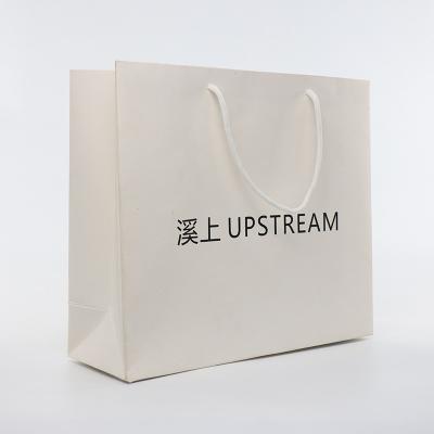 China Custom Printed Kraft Paper Bags with Handles Gravure Printing 30x40cm for sale