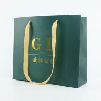 China 210gsm Coated Printed Luxury Paper Bags Glossy Lamination for Shopping Custom Logo for sale