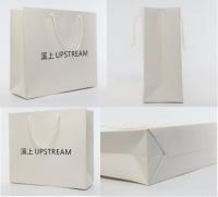 China Custom Logo White Kraft Paper Bags with Handles Gravure Printing 30x40cm for sale