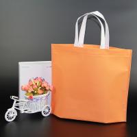 China Non Woven Garment Big Tote Bags Custom Printed Logo Recyclable Laminated 100-180 GSM for sale