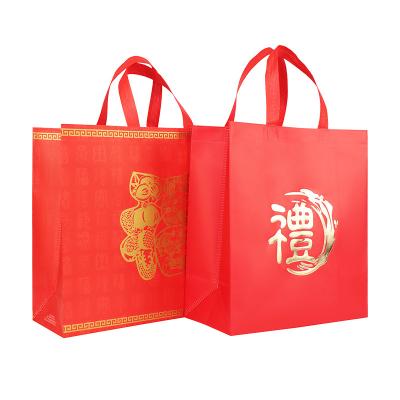 China Custom Non Woven Tote Gift Bags 80-180 GSM Reusable Christmas Shopping Bags with Gold Logo for sale