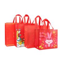China Custom Logo Non Woven Shopping Bag Reusable Chinese New Year Gift Bag 100 GSM for sale
