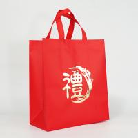 China Custom Logo Non Woven Shopping Bag Reusable Chinese New Year Gift Bag 100 GSM for sale