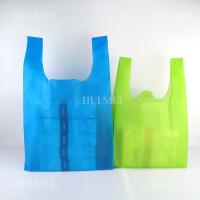 China Biodegradable Non Woven T Shirt Bag 25gsm Shrink Resistant Eco Friendly Shopping Bag for sale