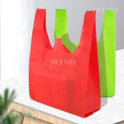 China Biodegradable Non Woven T Shirt Bag 25gsm Shrink Resistant Eco Friendly Shopping Bag for sale