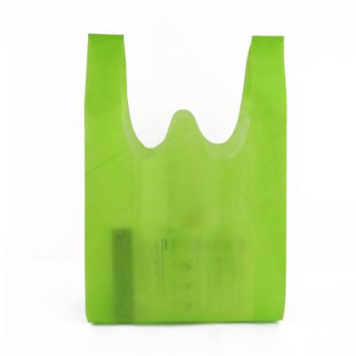 China Custom Non Woven T Shirt Shopping Bag 30x40cm Green Tote Handle Anti Pull for sale