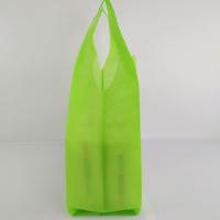 China Custom Non Woven T Shirt Shopping Bag 30x40cm Green Tote Handle Anti Pull for sale