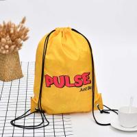 China Eco Promotional Non Woven Bag 105GSM Yellow Drawstring Grocery Tote for sale