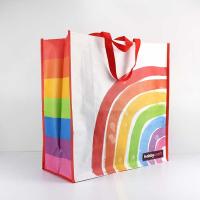 China Custom CMYK Gravure Print PP Woven Bags 120gsm Shrink Resistant Shopping Bags for sale
