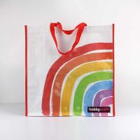 China Custom CMYK Gravure Print PP Woven Bags 120gsm Shrink Resistant Shopping Bags for sale
