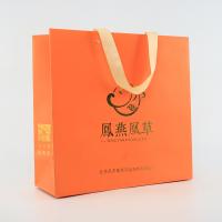 China Custom Logo Glossy Paper Shopping Bags with Rope Handles 28x20x10cm 120gsm for sale