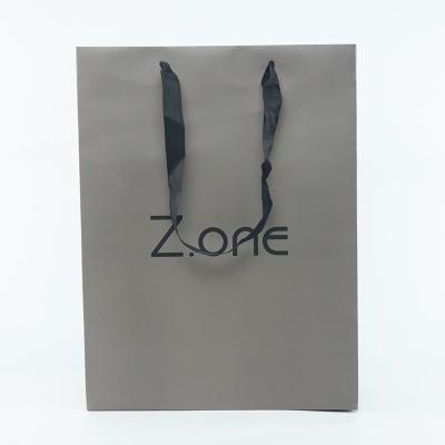 China Custom Coated Kraft Paper Shopping Bags for Clothes Gifts 300gsm with Ribbon Handle for sale