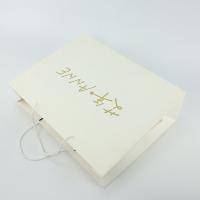 China Custom Kraft Paper Shopping Bags with Logo 80-300gsm Foldable Reusable for sale