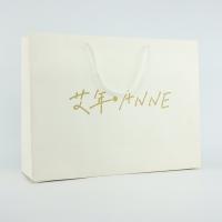 China Custom Kraft Paper Shopping Bags with Logo 80-300gsm Foldable Reusable for sale