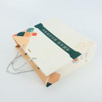 China Custom Logo White Paper Bags with Ribbon Handle for Boutique Shopping 3000pcs MOQ for sale