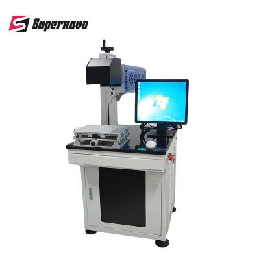 China DMC-30W Co2 Laser Marking Machine 0.8mm Mini Character 10.6um Wavelength for sale
