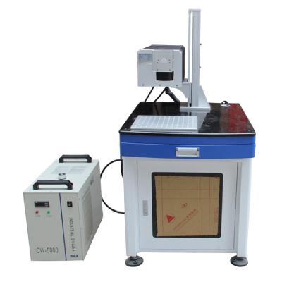 China Supernova Laser DMU-3W 5W UV Laser Marking Machine for USB Cable for sale