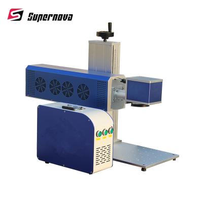 China Desktop 30W CO2 Laser Marking Machine For Leather Jeans Plastic for sale