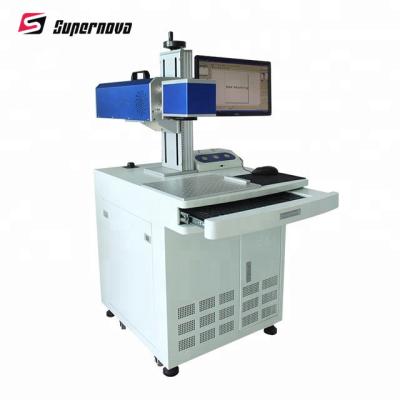 China High Speed Co2 Laser Marker Printing on Cloth / Plastic FDA Certification for sale