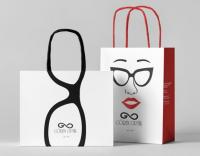 China Embossed Printing Paper Bag 250gsm Printed Paper Carrier Bags for sale