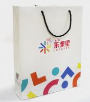China Embossed Printing Paper Bag 250gsm Printed Paper Carrier Bags for sale
