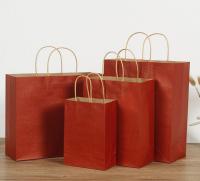 China Embossed Printing Paper Bag 250gsm Printed Paper Carrier Bags for sale