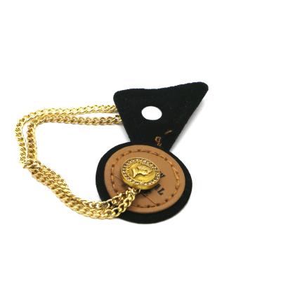 China Triangle Custom Leather Patches For Jackets with Metal hanging chain 5cm×3.5cm for sale