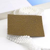 China Hot Pressed Leather Patches For Clothes Letter Logo Pattern OEM for sale