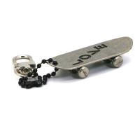 China Alloy Doll Key Chain Boy Skateboard Shape For Clothes 5cm×2cm Size for sale