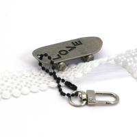 China Alloy Doll Key Chain Boy Skateboard Shape For Clothes 5cm×2cm Size for sale