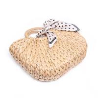 China Round Wrist Beach Woven Bag , Handmade Crochet Handbags Corn Skin Material ODM for sale