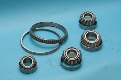 China Open Type Single Row Tapered Roller Bearings Standard With Brass / Bronze Cage for sale