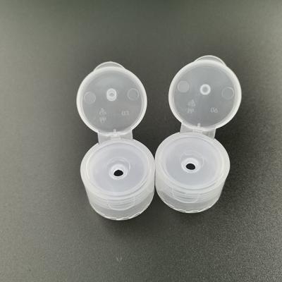 China Press Top Transparent 28 / 410 Plastic Bottle Caps for sale