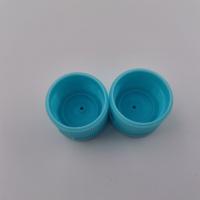 China Disc Ribbed Closure 15ml Plastic Bottle Caps 24/410 for sale