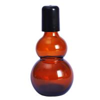 China Calabash Amber Glass Odm Roll On Essential Oil Bottles With Stainless Steel Massage Ball for sale