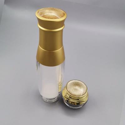 China Oem Luxury Acrylic Airless Cosmetic Packaging Set Lotion Bottle And Cream Jar for sale