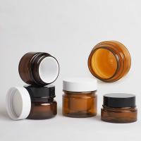 China Pet Amber Plastic BPA Free Cosmetic Cream Containers With Black Lids for sale