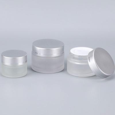 China 50 Gram / 50Ml Empty Cosmetic Cream Jar Round Frosted Glass for sale