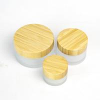 China 50ml / 1.7oz Frosted Glass Cosmetic Cream Jar With Bamboo Lids for sale