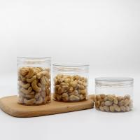 China PET Plastic Round Jar Candy Powder Dried Fruit Storage With Silver Lids for sale