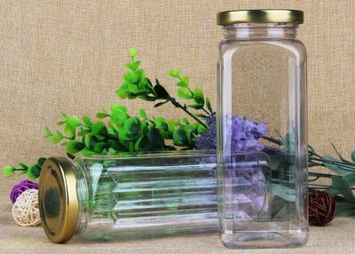 China Damp Proof Square Transparent Plastic Jars 550ml with Iron Lid for Food Packaging for sale