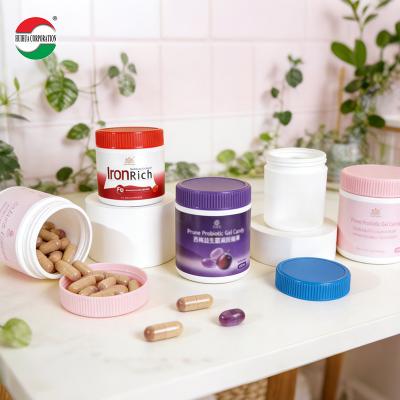 China Food Grade HDPE Vitamin Bottles 500ml 1000ml Colored Capsule Shape Sealed Containers for sale