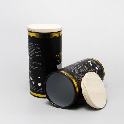 China OEM Custom Food Grade White Cardboard Paper Tube with Wooden Cap Cylinder Container for Tea 5000pcs MOQ for sale
